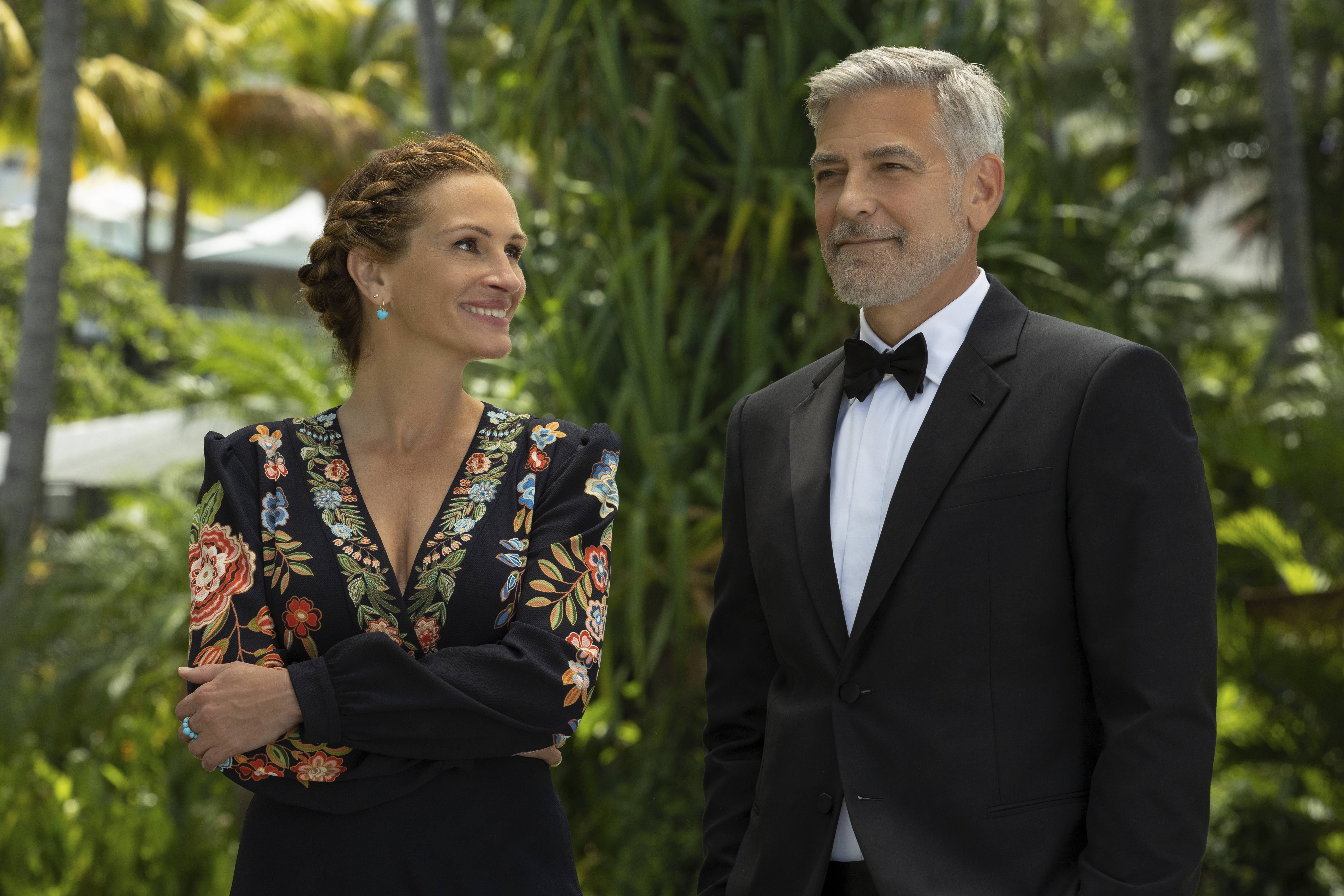 Mega star power of Clooney and Roberts brightens formulaic ‘Ticket to ...